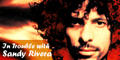 In Trouble with Sandy Rivera · Feature RA